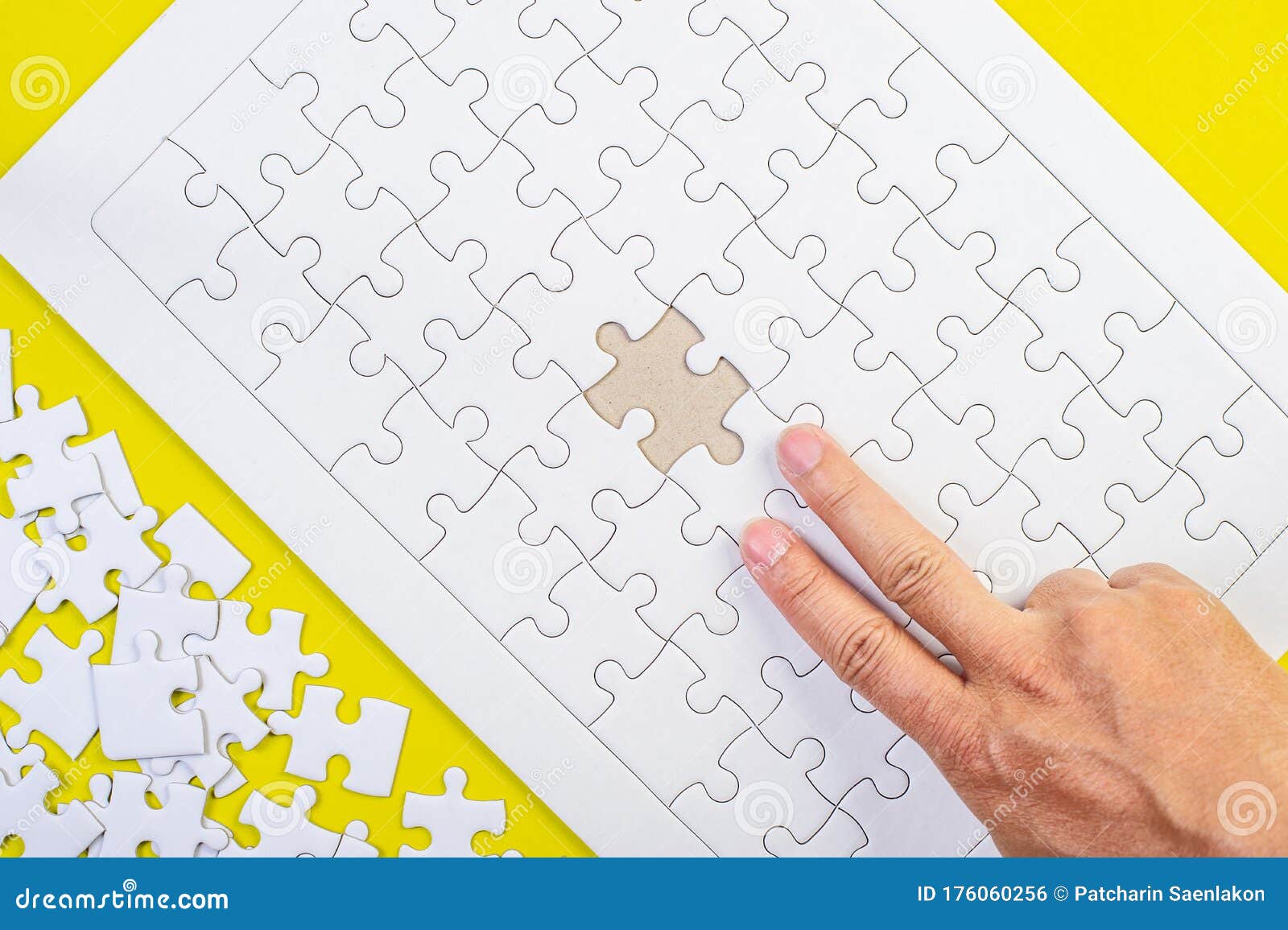 Jigsaw and Hands on the Yellow Concept Background Stock Photo - Image ...