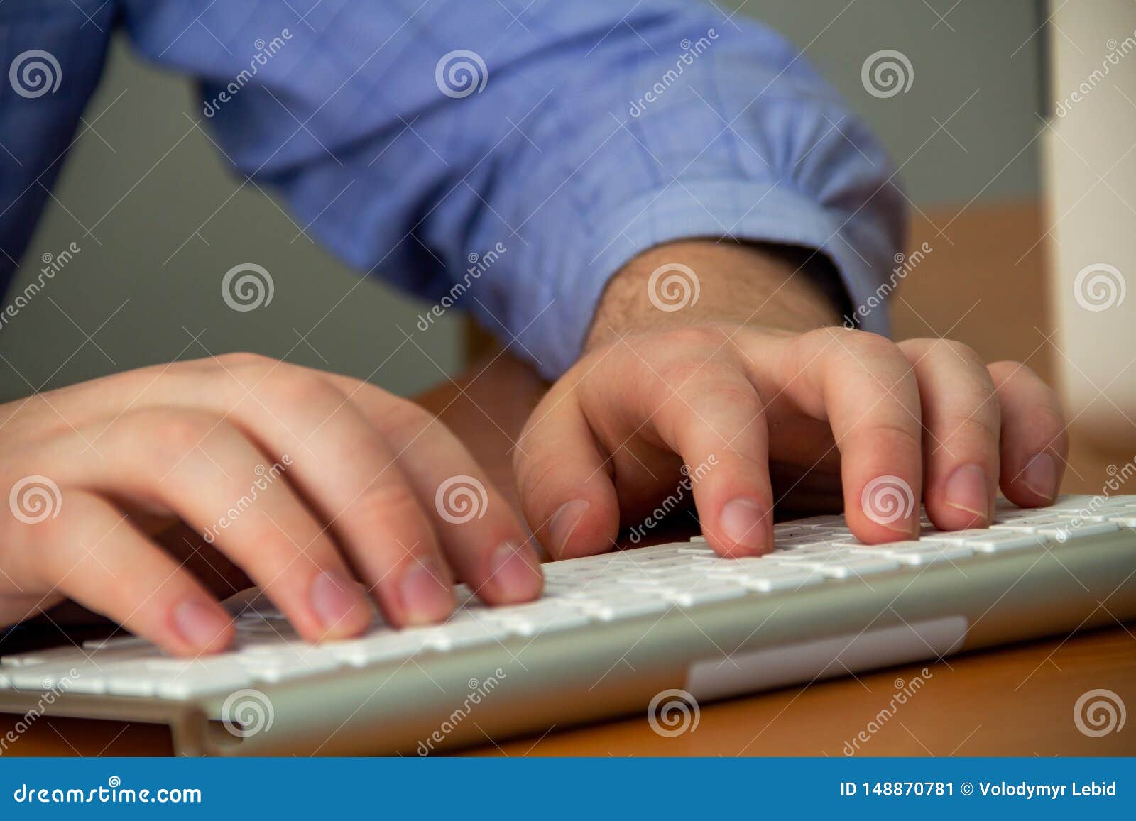Hands of a Young Man on a Computer Keyboard Close-up, with Depth of ...