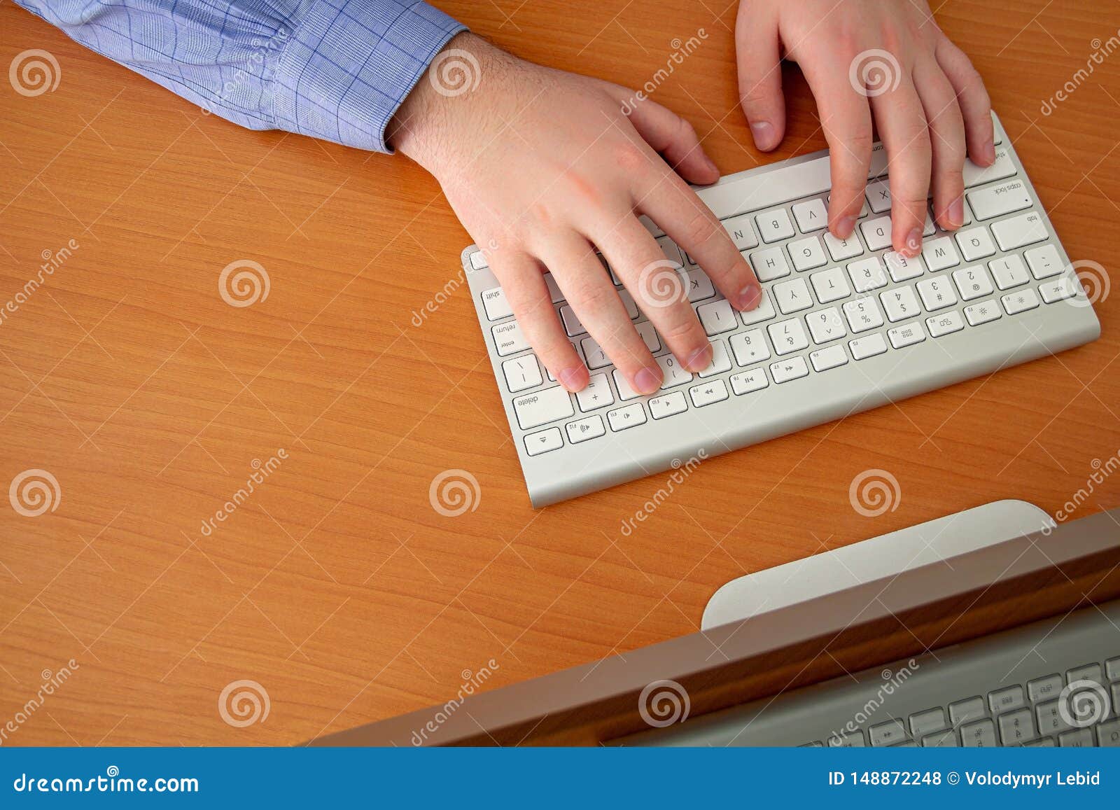 Hands of a Young Man on a Computer Keyboard, Top View. the Concept of ...