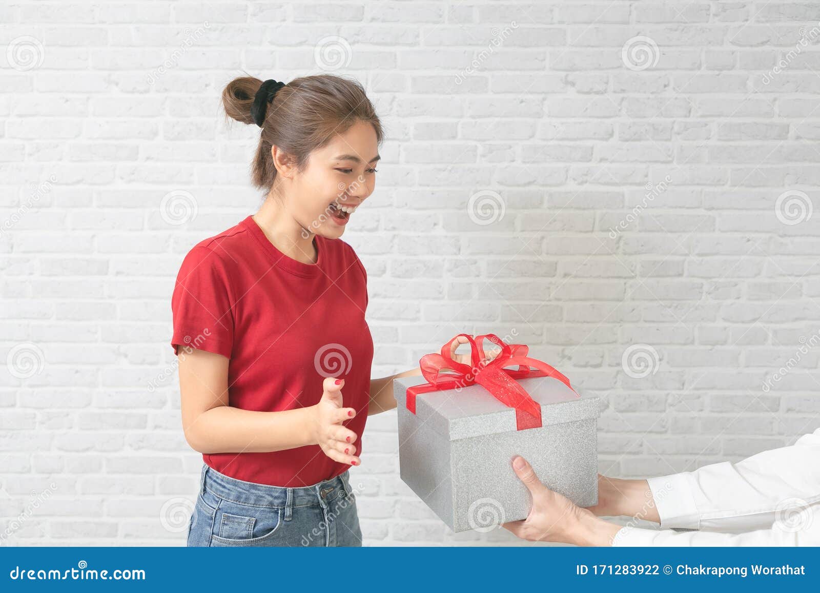 Hands of Young Man is Giving a Present To His Lovely Stock Photo ...