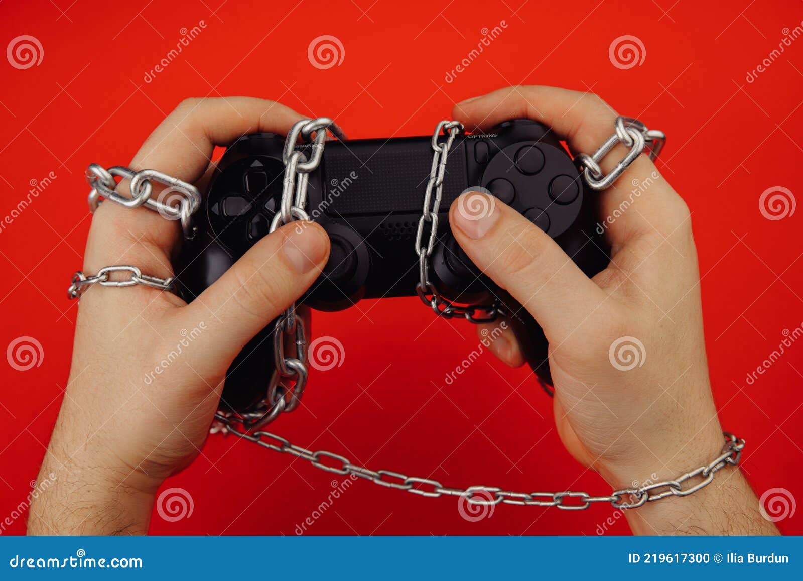 Hands of a Young Man with are Tied and Holds a Game Controller in His ...