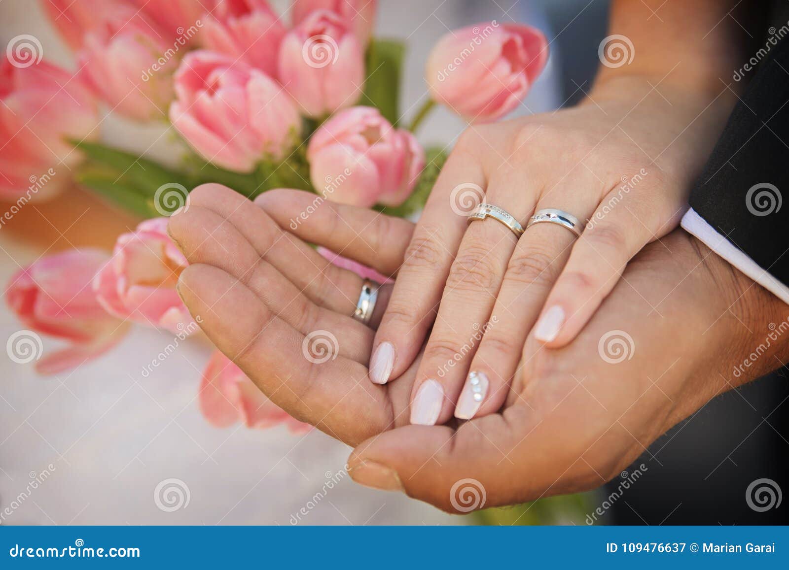 The Hands of Married Couples and the Wedding Bouquet Stock Image ...
