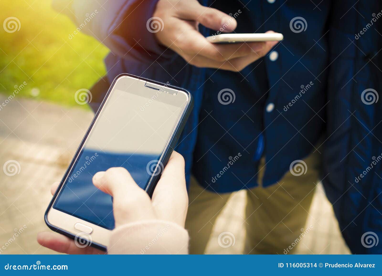 Group with mobile phone stock photo. Image of games - 116005314