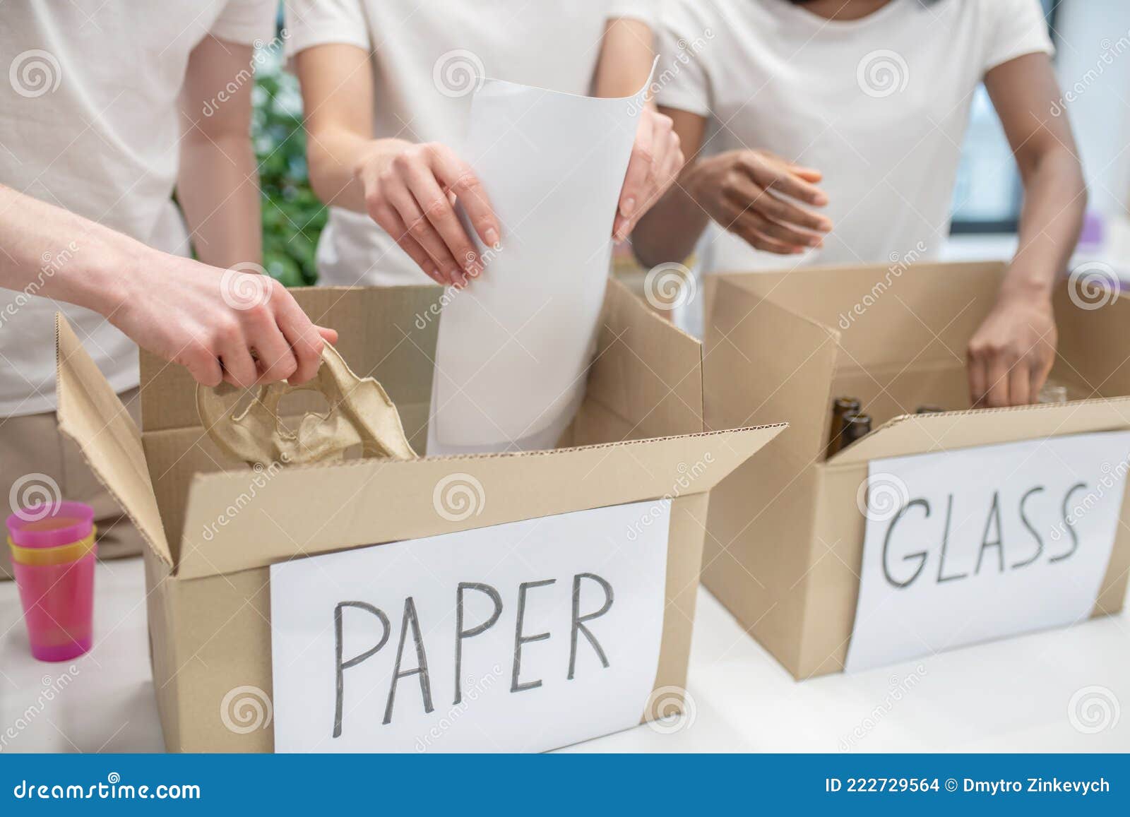 Hands of Young People Sorting Paper and Glass Stock Photo - Image of ...