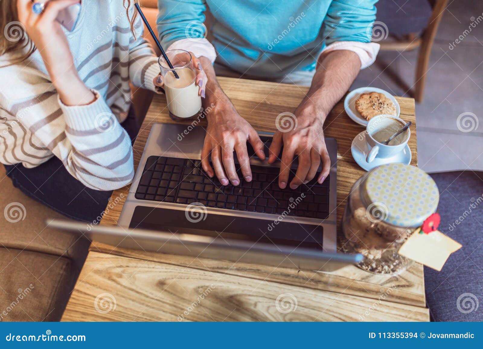 Hands of Young People Typing on Laptop in Cafe with Cup of Coffee Stock ...