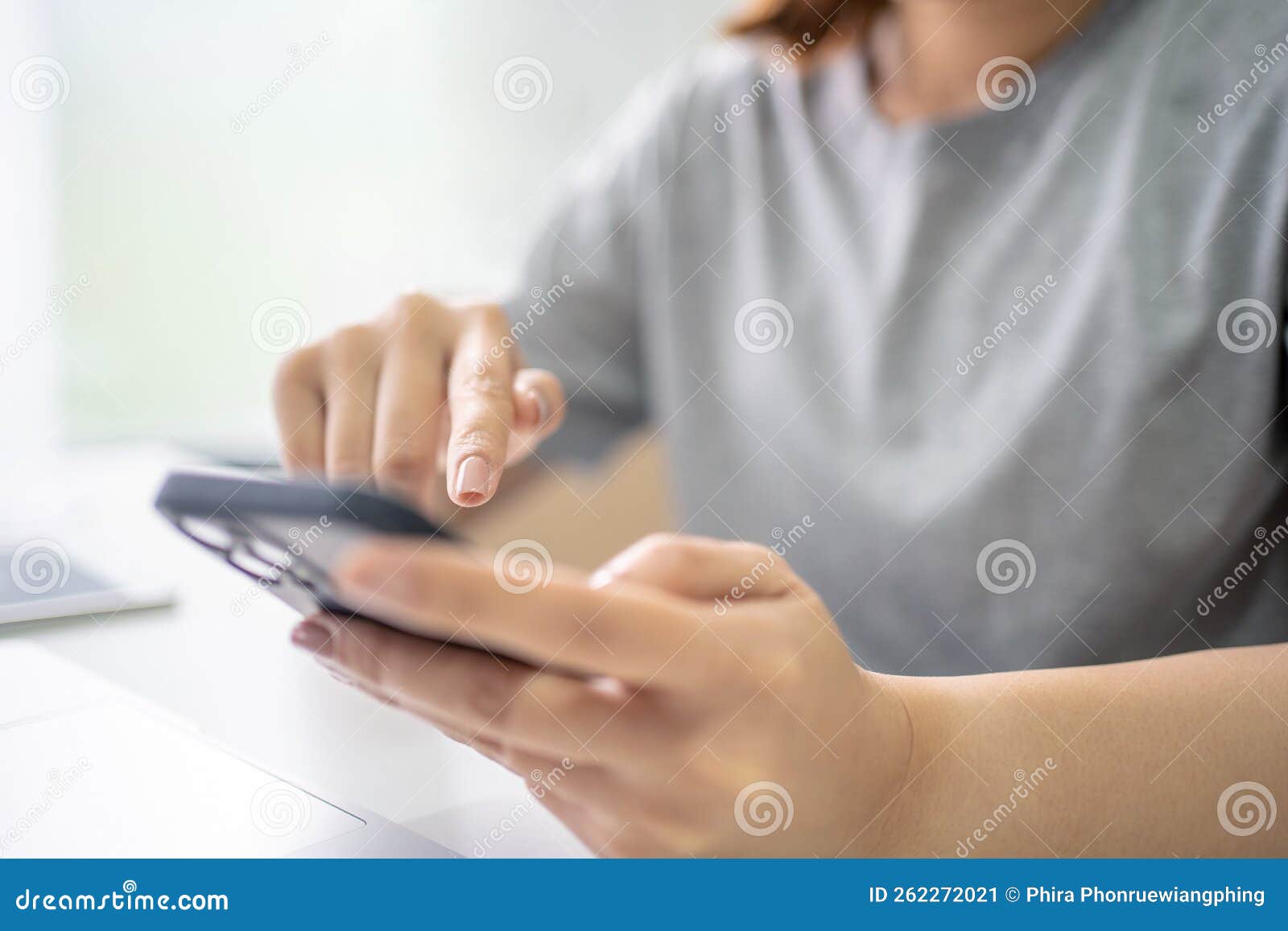 Hands of Young Woman Pointing at Smartphone Screen Over Laptop Keypad ...