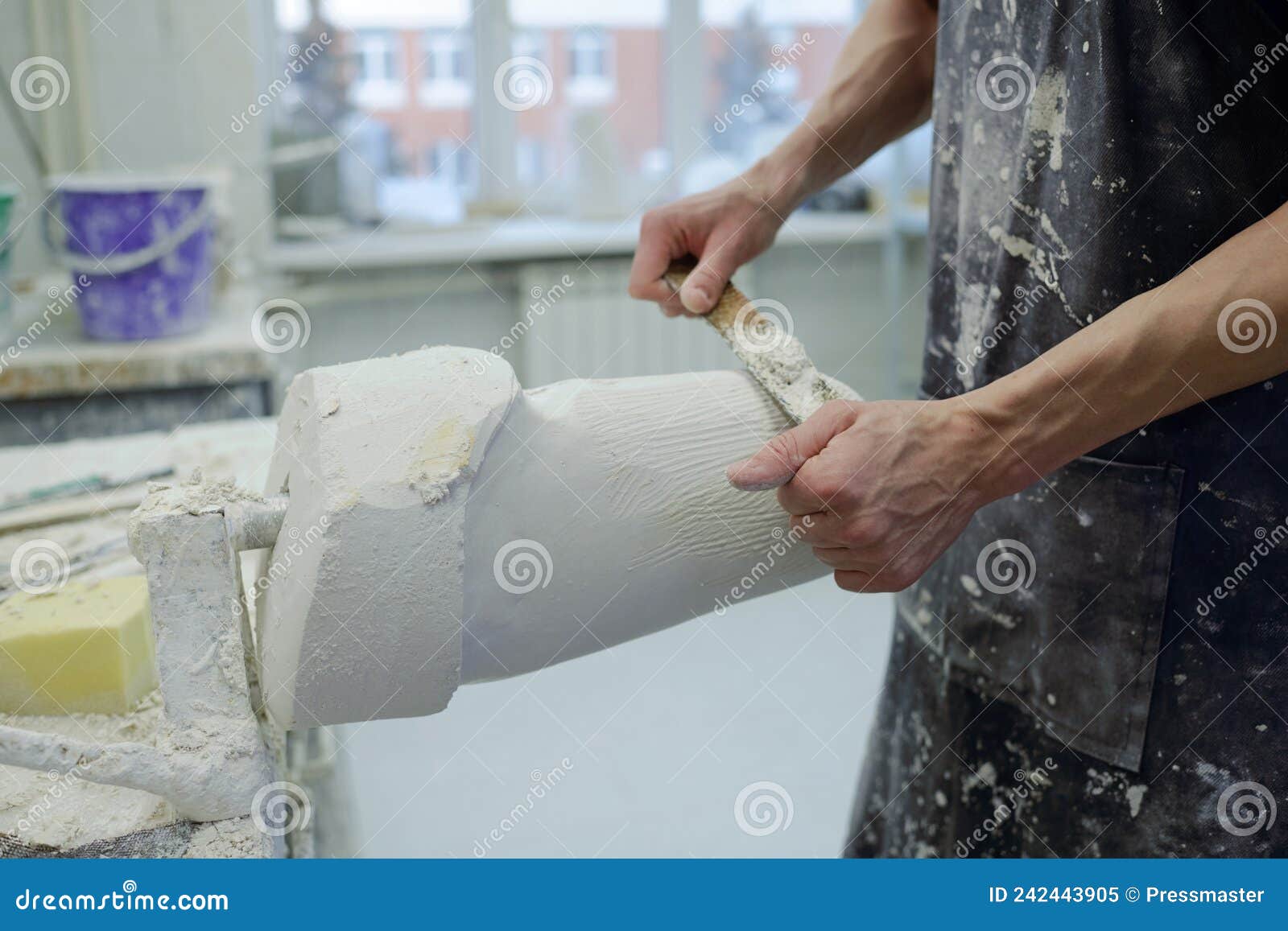 Hands of Young Worker in Apron Polishing Plaster Cast Stock Image - Image of handtool, smoothen ...