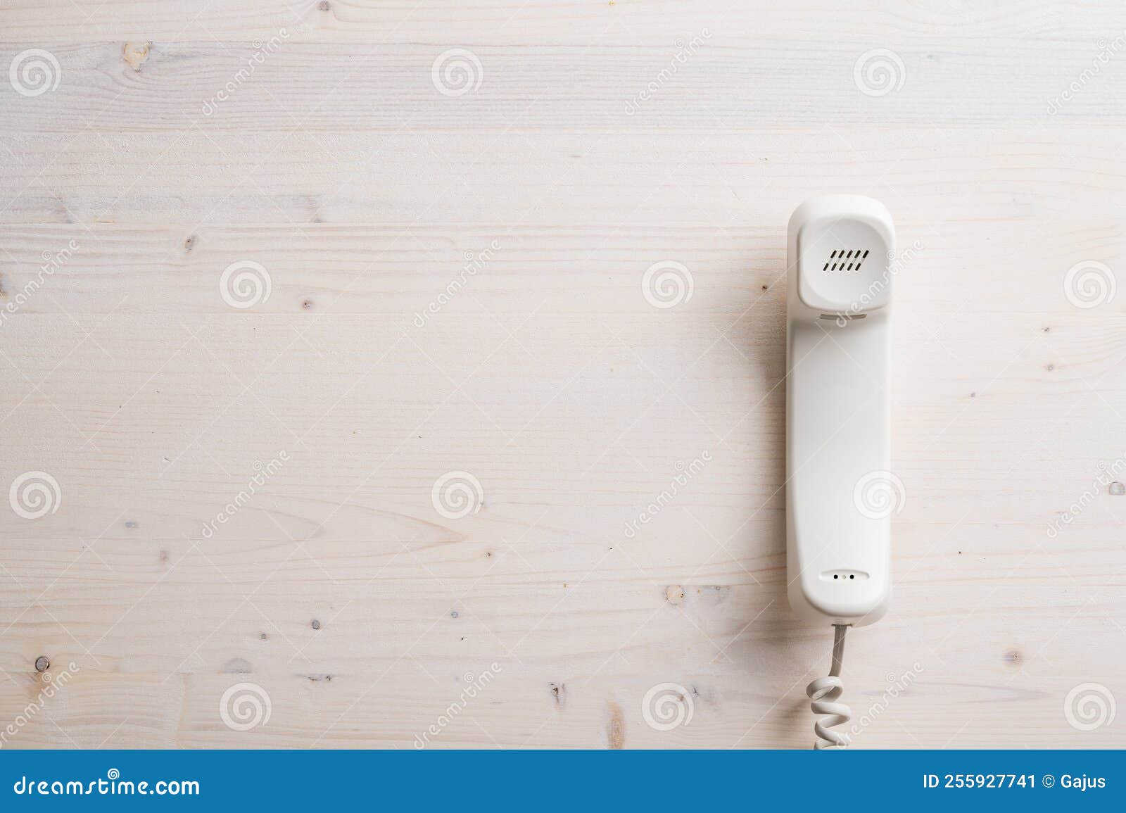 Handset of a White Landline Phone Placed on Plain Wooden Board Stock ...