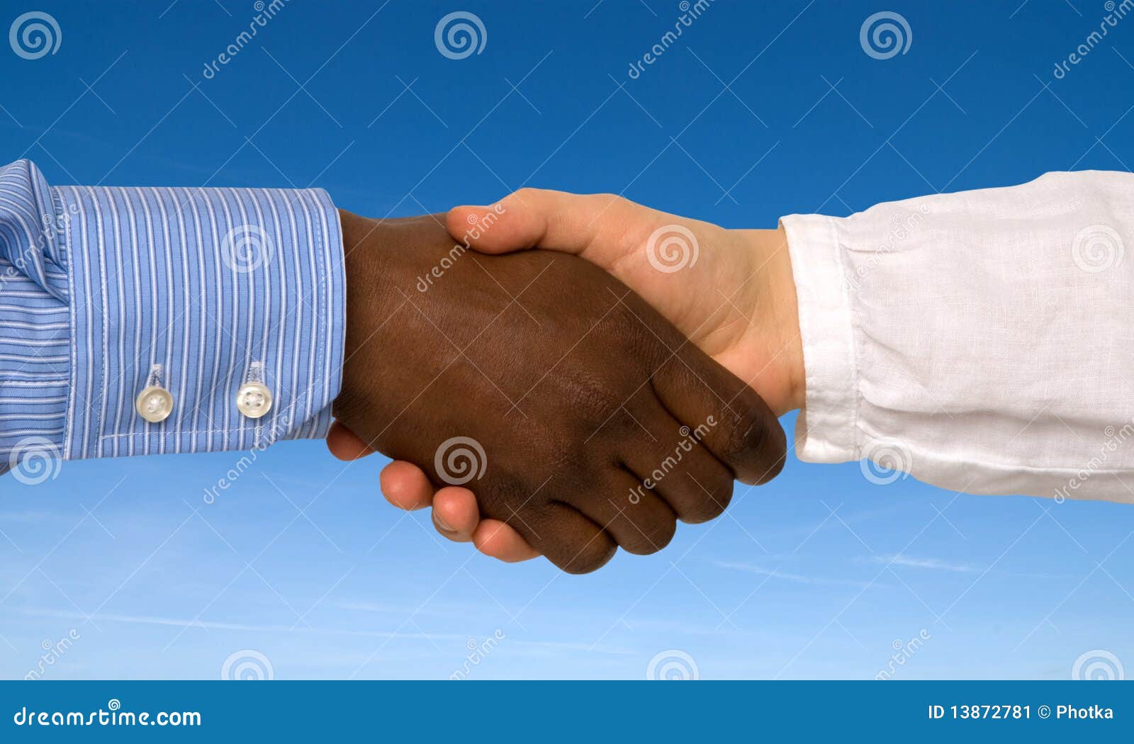 Different Races Shaking Hands
