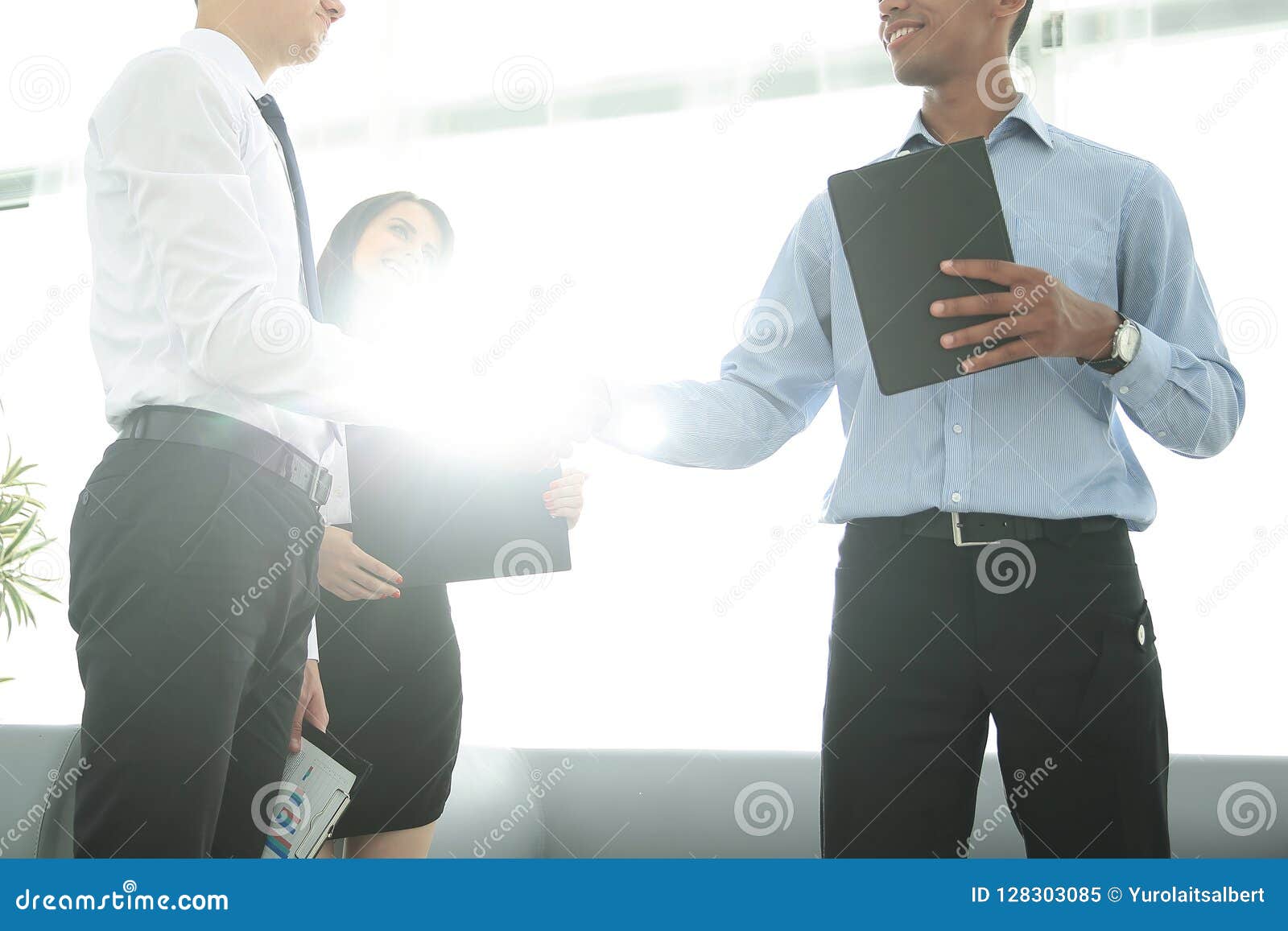 Handshake of Business Partners Standing in the Office Stock Image ...