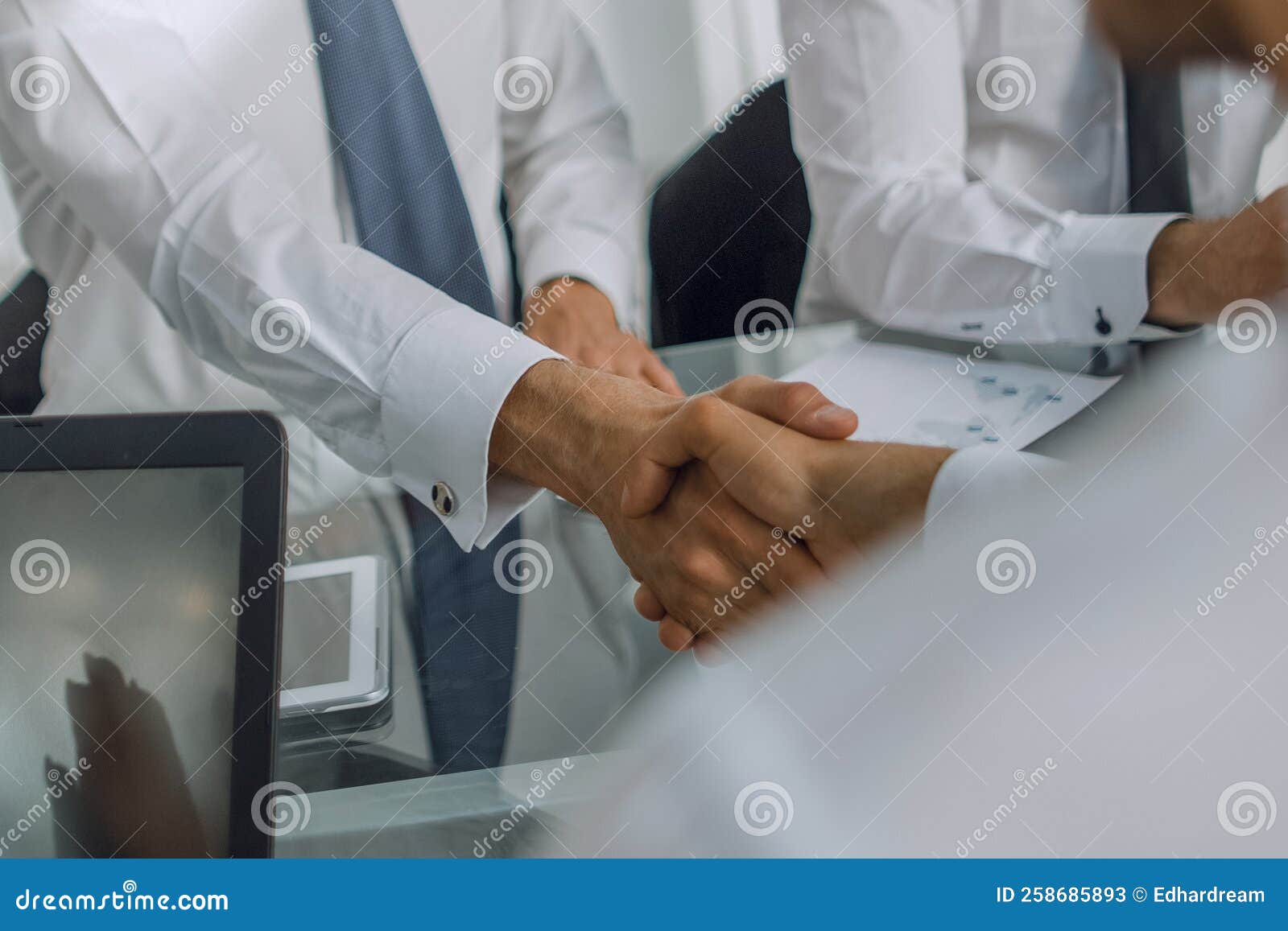 Handshake of Business People on a Work Desk. Stock Image - Image of ...