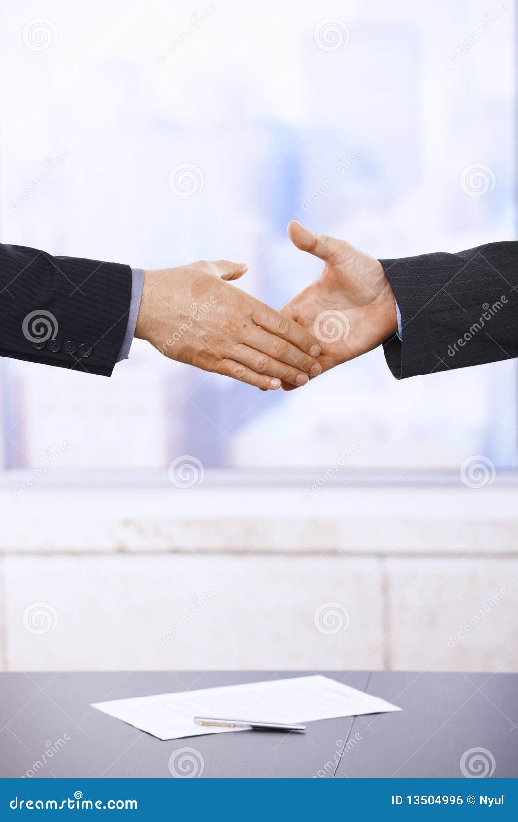 Handshake in closeup stock photo. Image of colleagues - 13504996