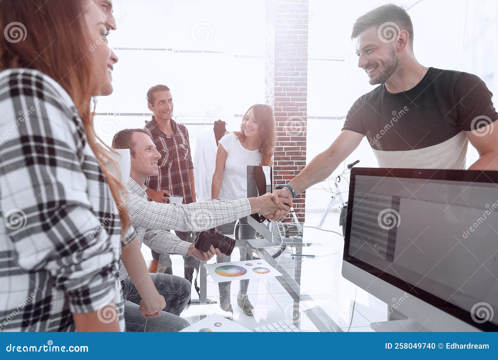 Handshake of Colleagues in a Creative Office. Stock Photo - Image of ...