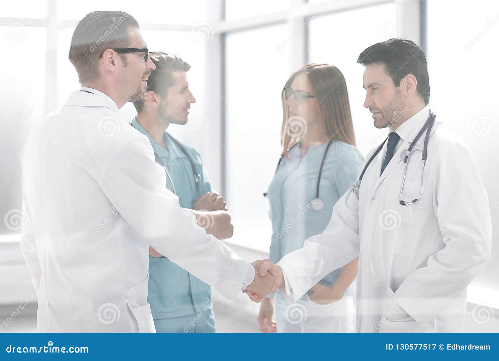 Handshake Colleagues in the Hospital Corridor Stock Image - Image of ...