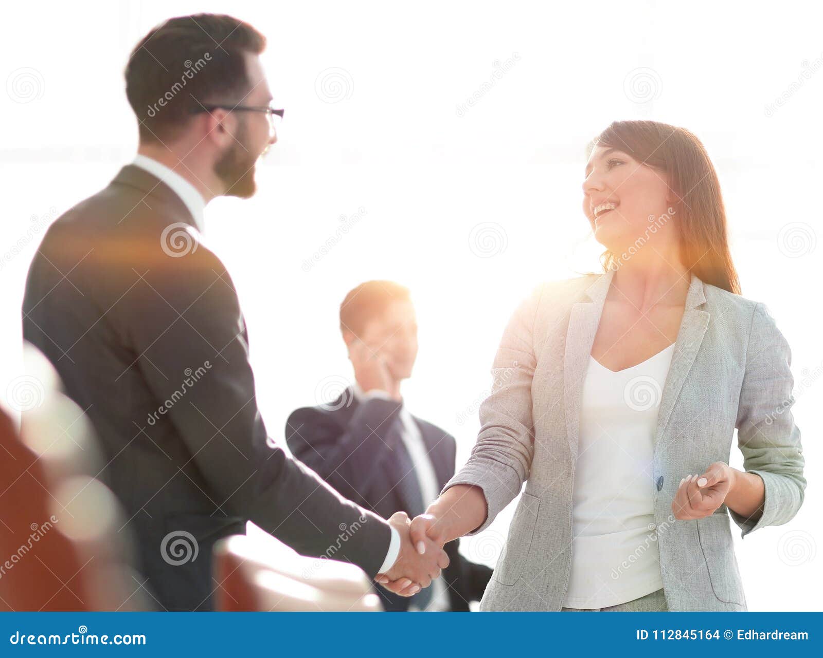 Handshake between Colleagues in the Workplace Stock Photo - Image of ...