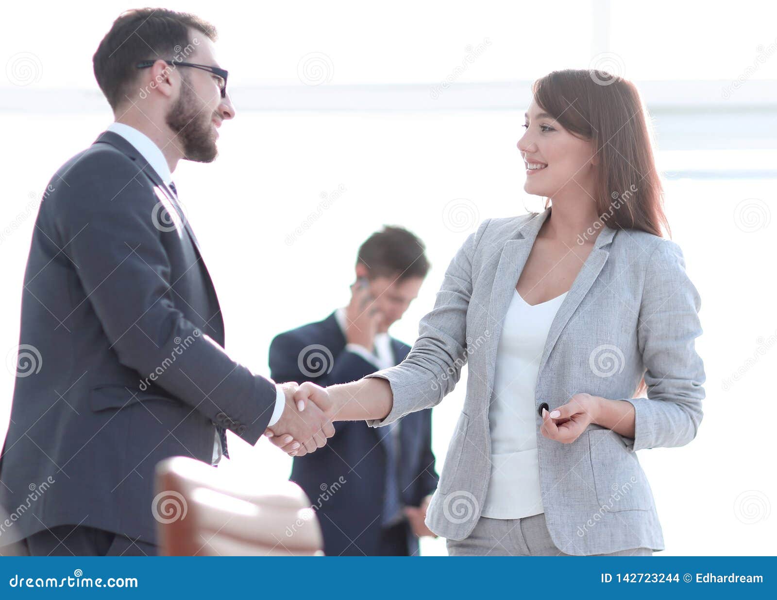 Handshake between Colleagues in the Workplace Stock Photo - Image of ...