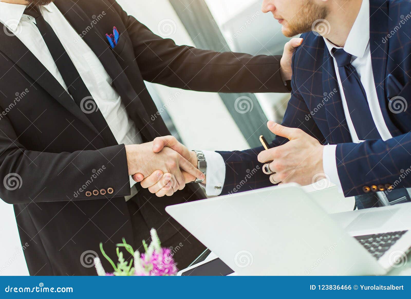 Handshake between Colleagues in the Workplace in a Modern Office Stock ...