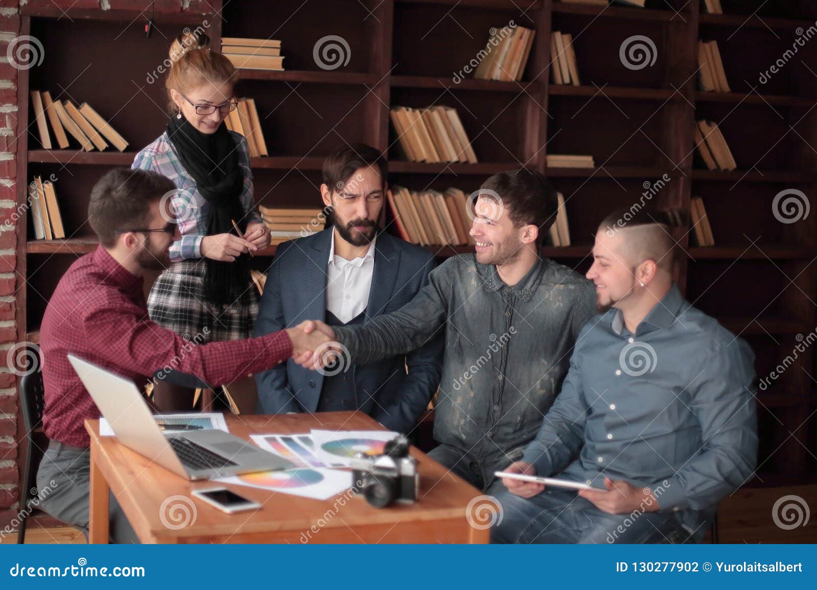 Handshake of Creative Partners in the Design Studio Stock Photo - Image ...