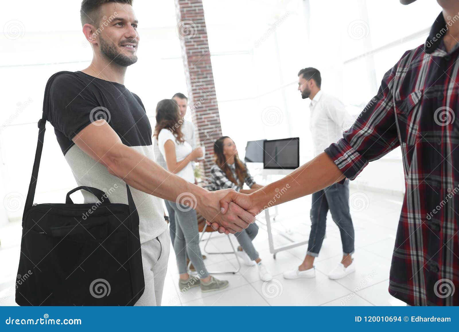 Handshake between the Designer and the Client Stock Photo - Image of ...