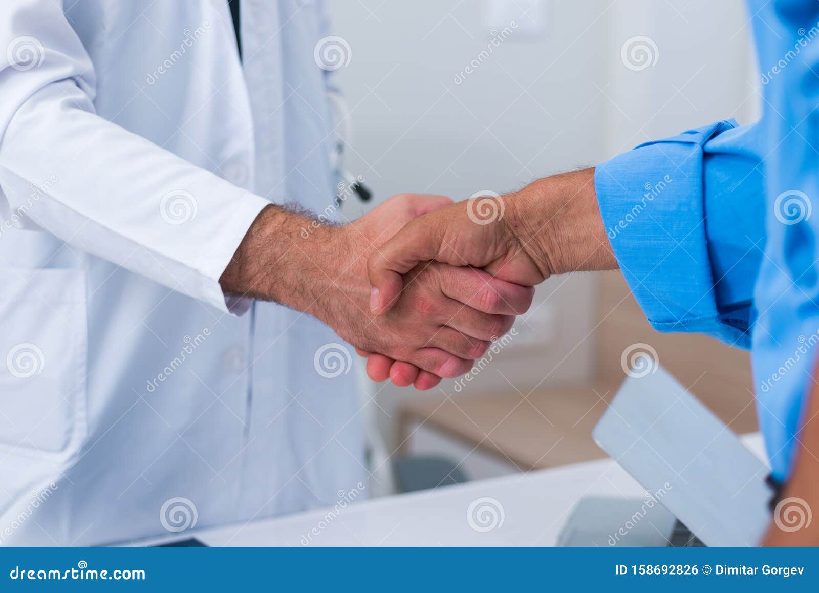 Handshake between a Doctor and His Senior Old Patient Stock Photo ...