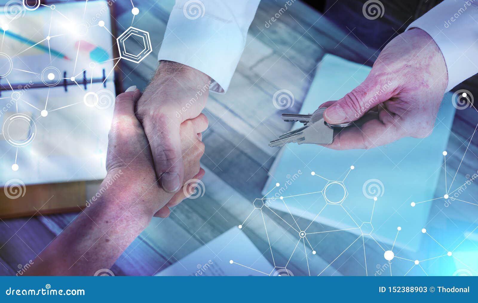 Handshake in a Real Estate Transaction; Light Effect Stock Image ...