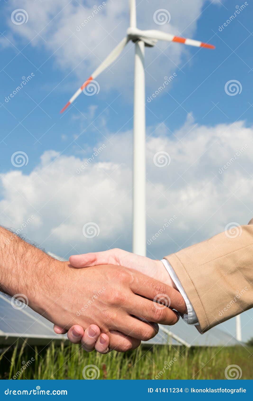 Handshake in Front of Wind Turbine and Blue Sky Stock Photo - Image of ...