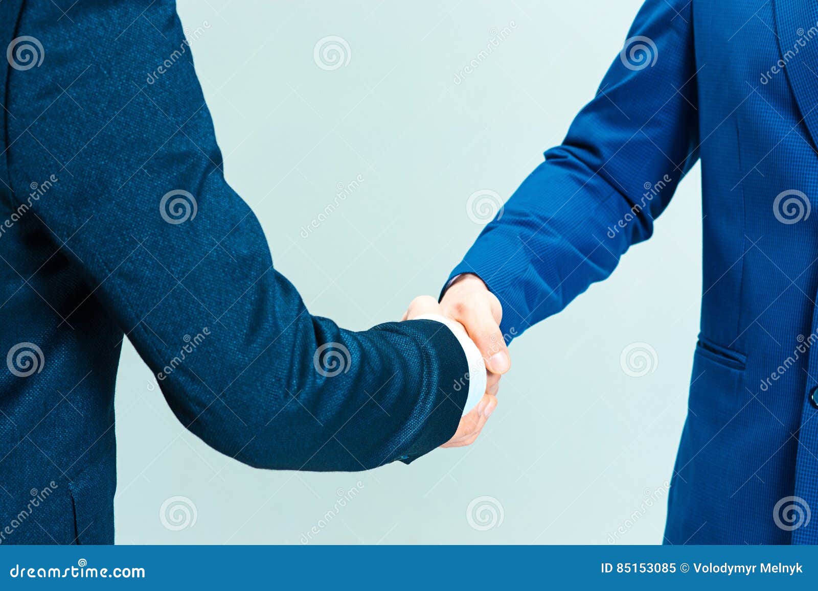 Handshake on gray stock image. Image of appointment, hand - 85153085