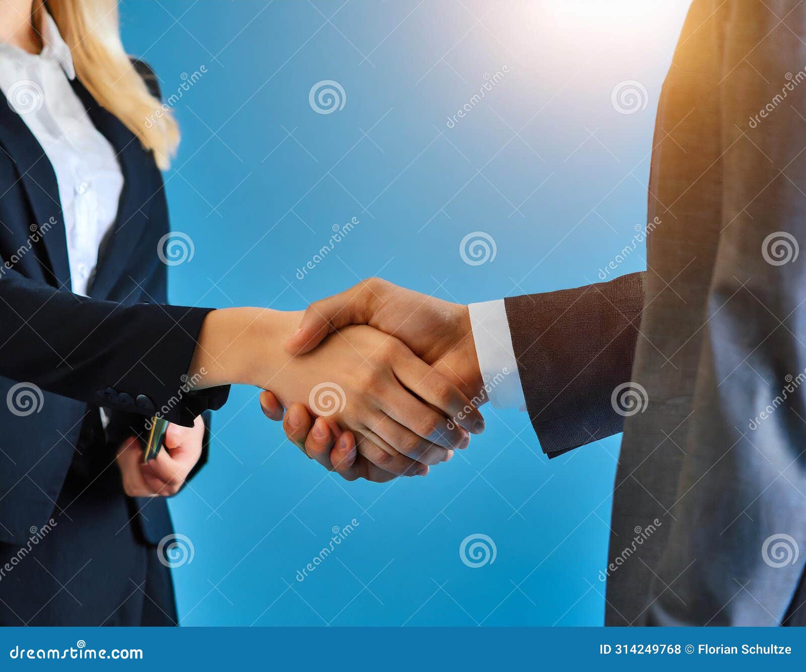 A Handshake Isolated on a Blue Background is a Concept of Relationships ...