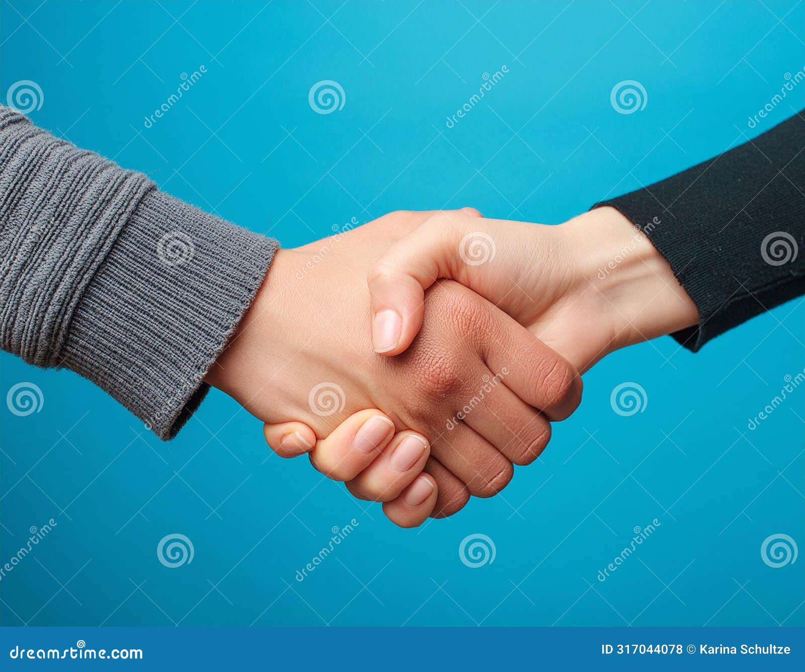 A Handshake Isolated on a Blue Background is a Concept of Relationships ...