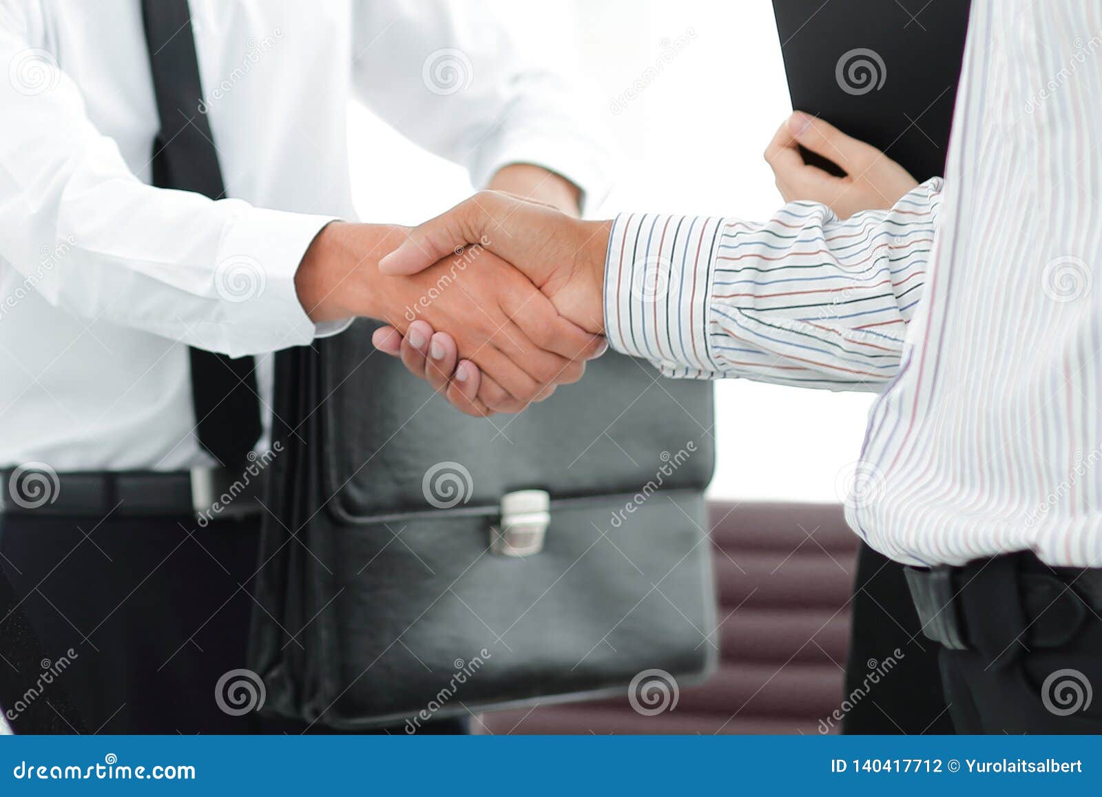 Handshake between Lawyer and Client in a Modern Office Stock Photo ...
