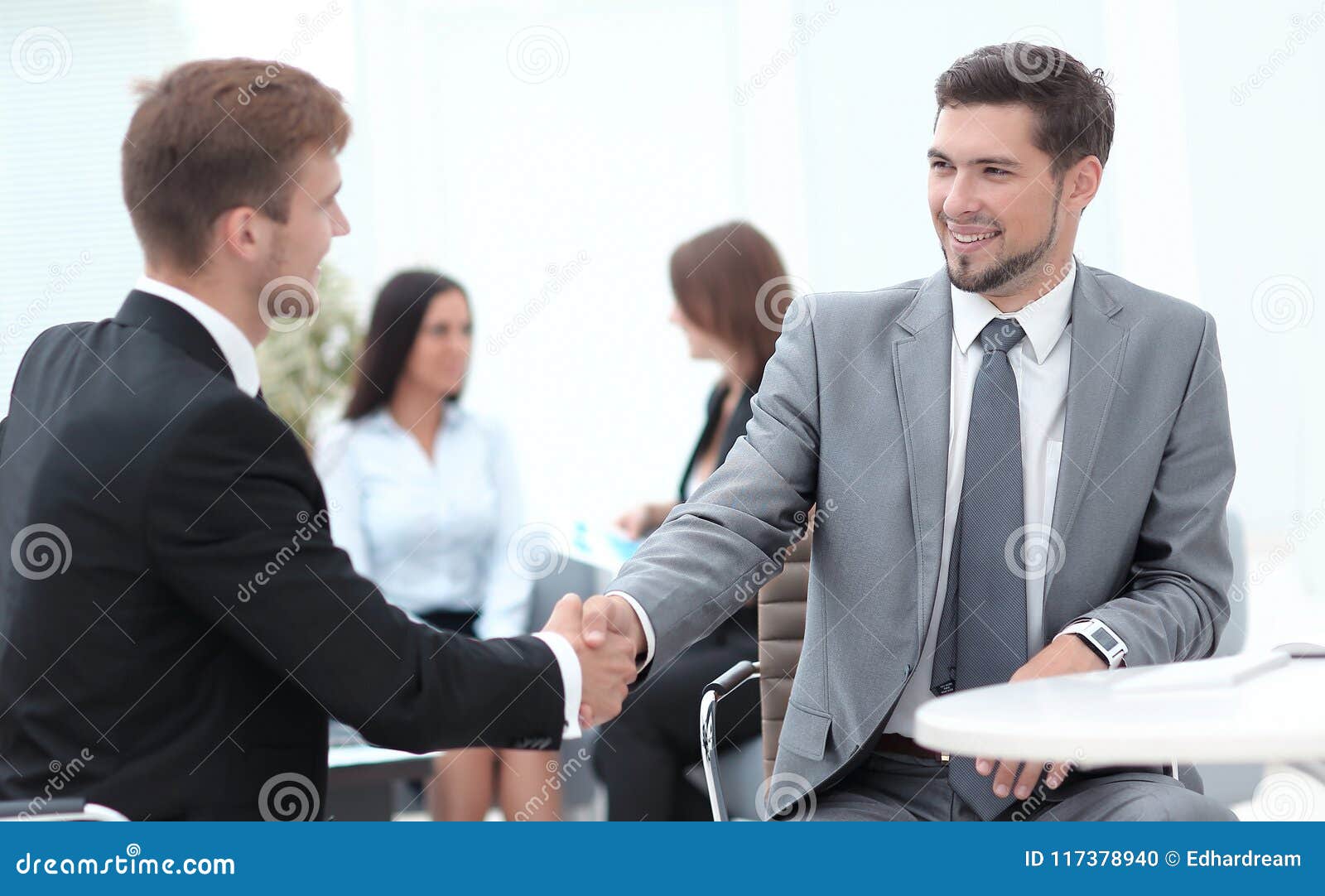 Handshake Manager and the Client in the Office. Stock Photo - Image of ...