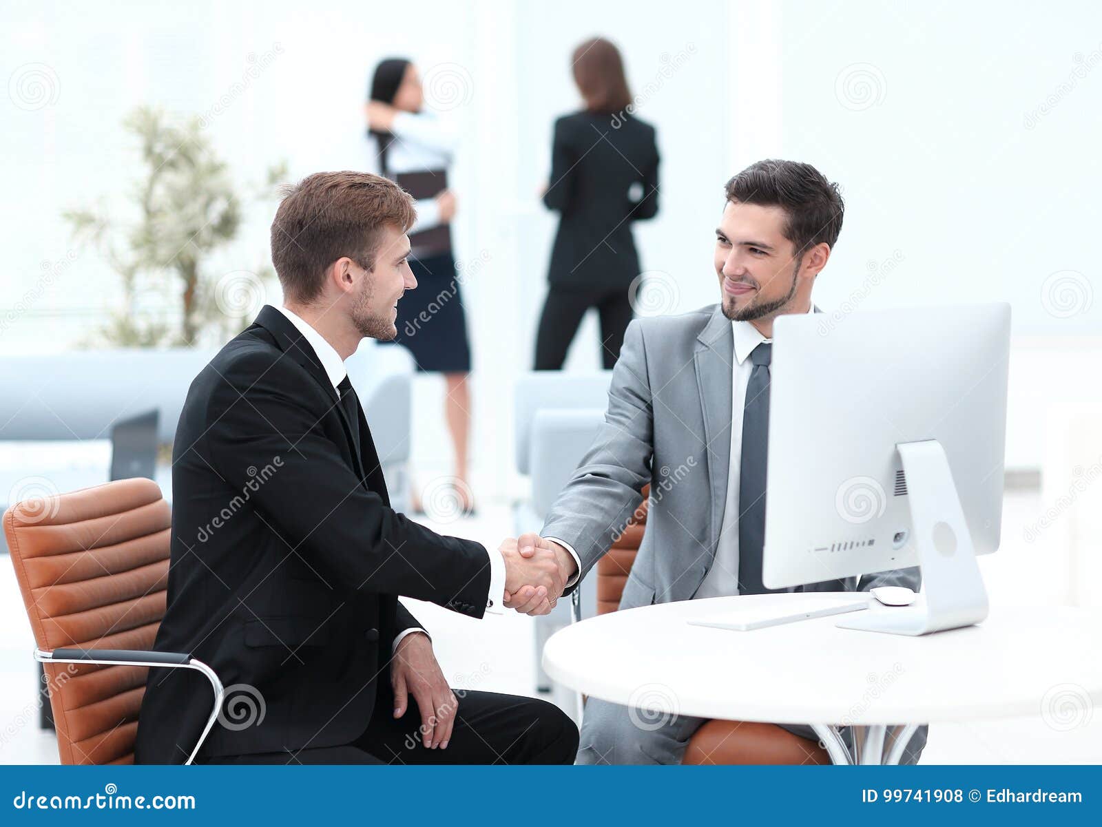 Handshake Manager and the Client in the Office. Stock Photo - Image of ...