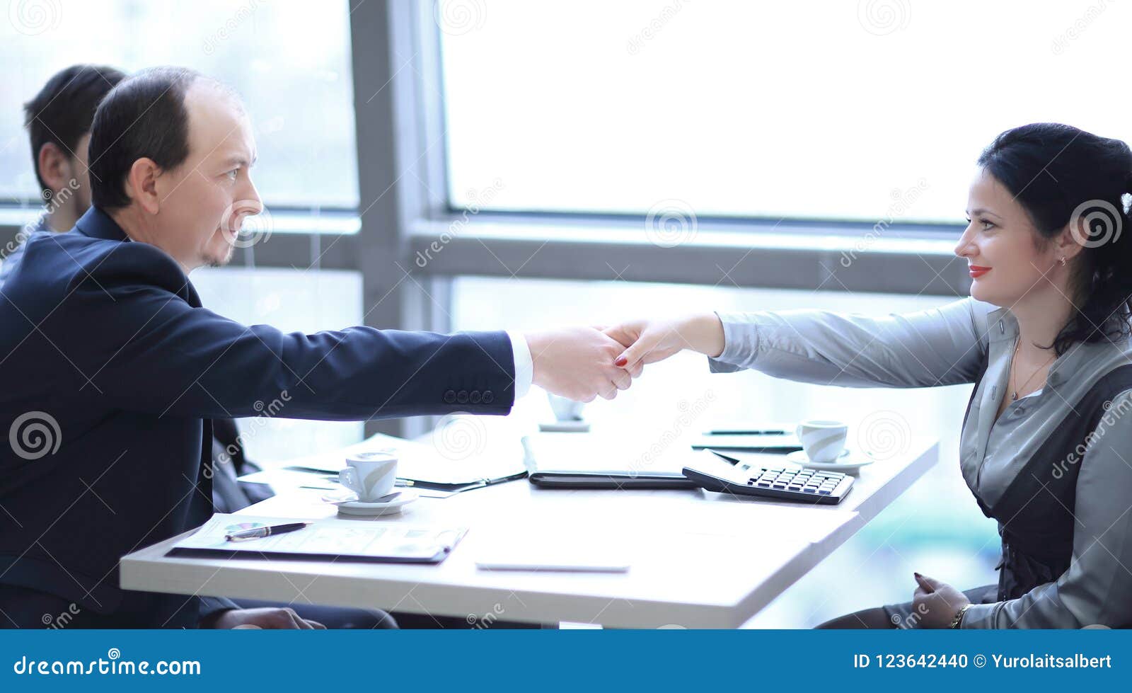 Handshake Manager and the Client Over a Desk Stock Photo - Image of ...