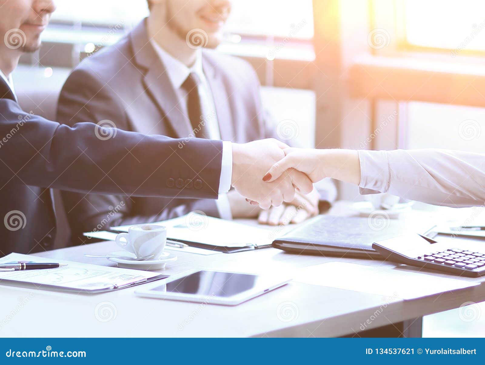 Handshake Manager and the Client Over a Desk Stock Image - Image of ...