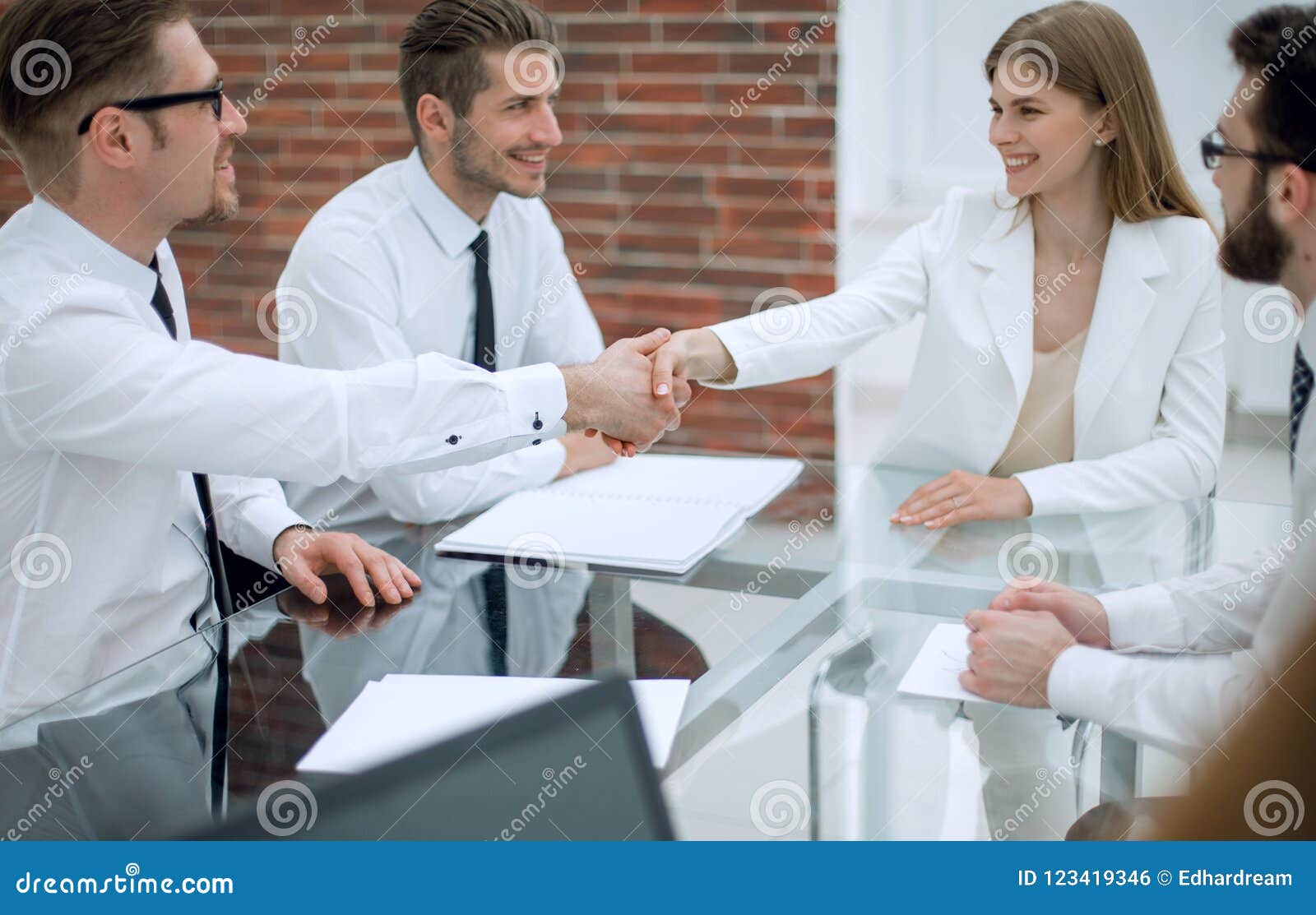 Handshake Manager and Client Over the Desktop Stock Photo - Image of ...