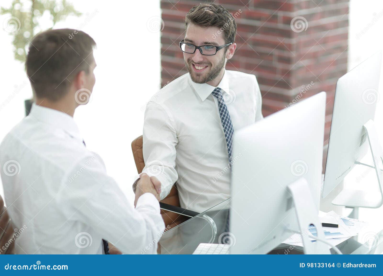 Handshake Manager and Customer in a Modern Office Stock Photo - Image ...