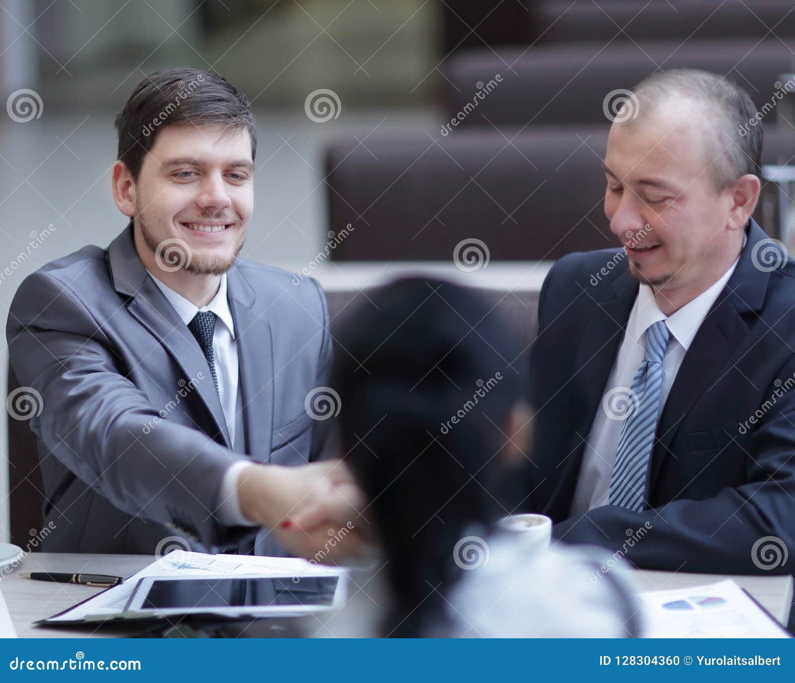 Handshake Manager and Customer in a Modern Office. Stock Photo - Image ...
