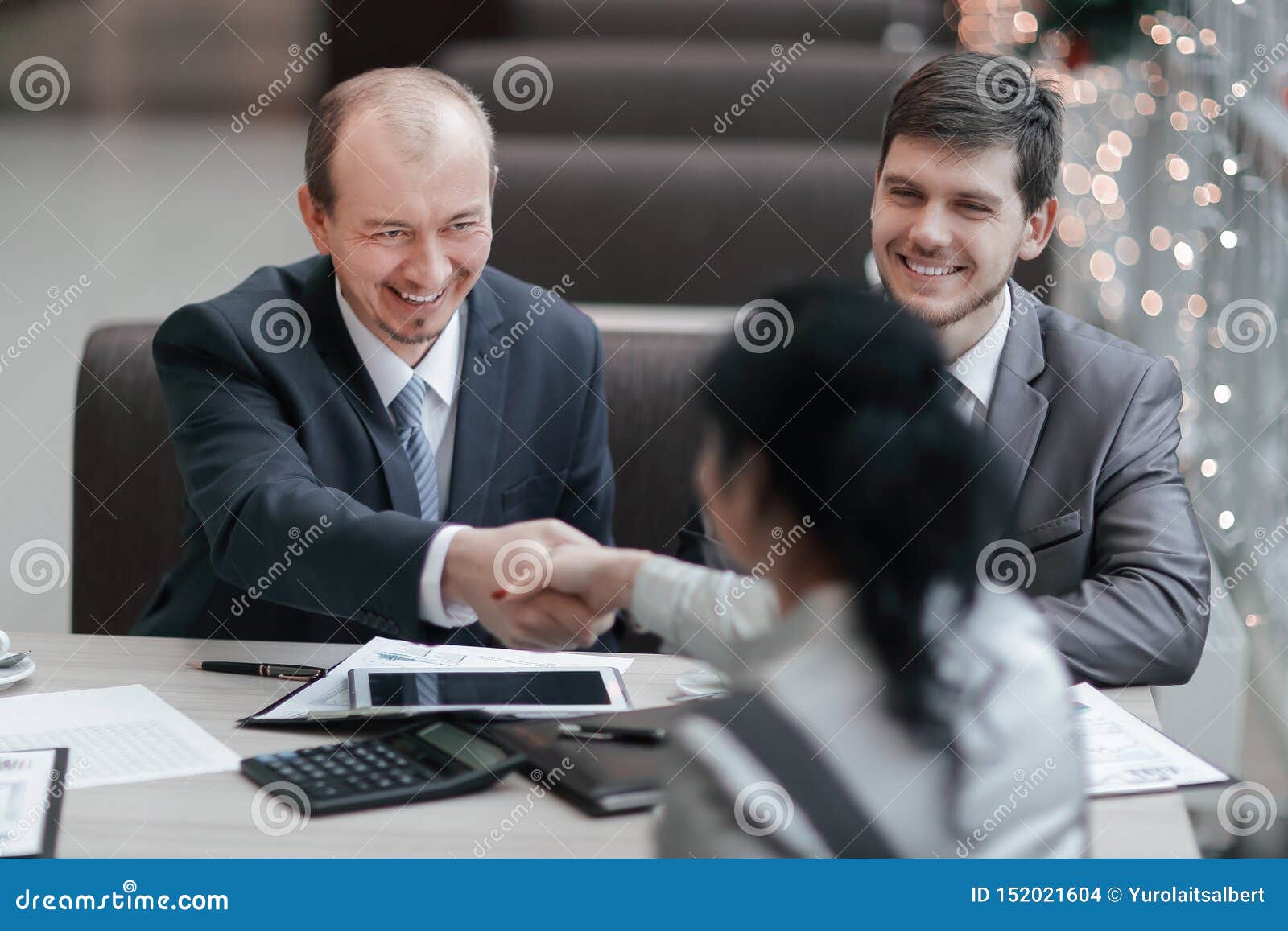 Handshake Manager and Customer in a Modern Office. Stock Photo - Image ...