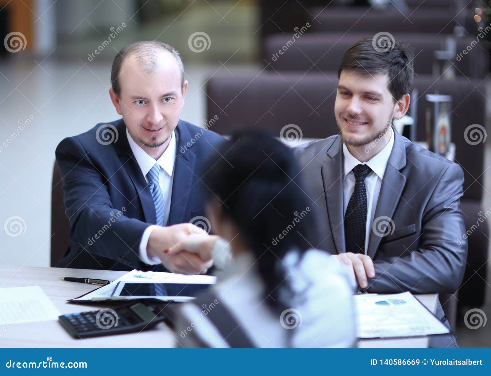 Handshake Manager and Customer in a Modern Office. Stock Image - Image ...