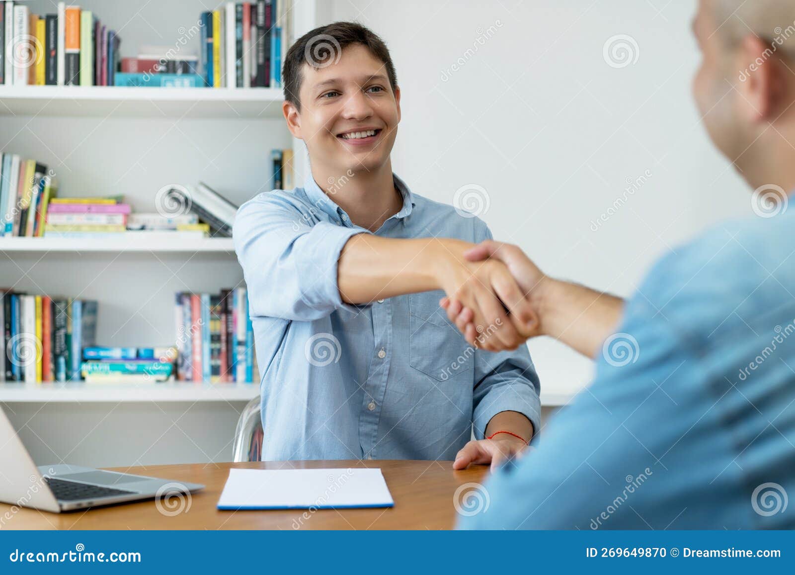 Handshake of Motivated Software Engineer after Succesful Job Interview ...