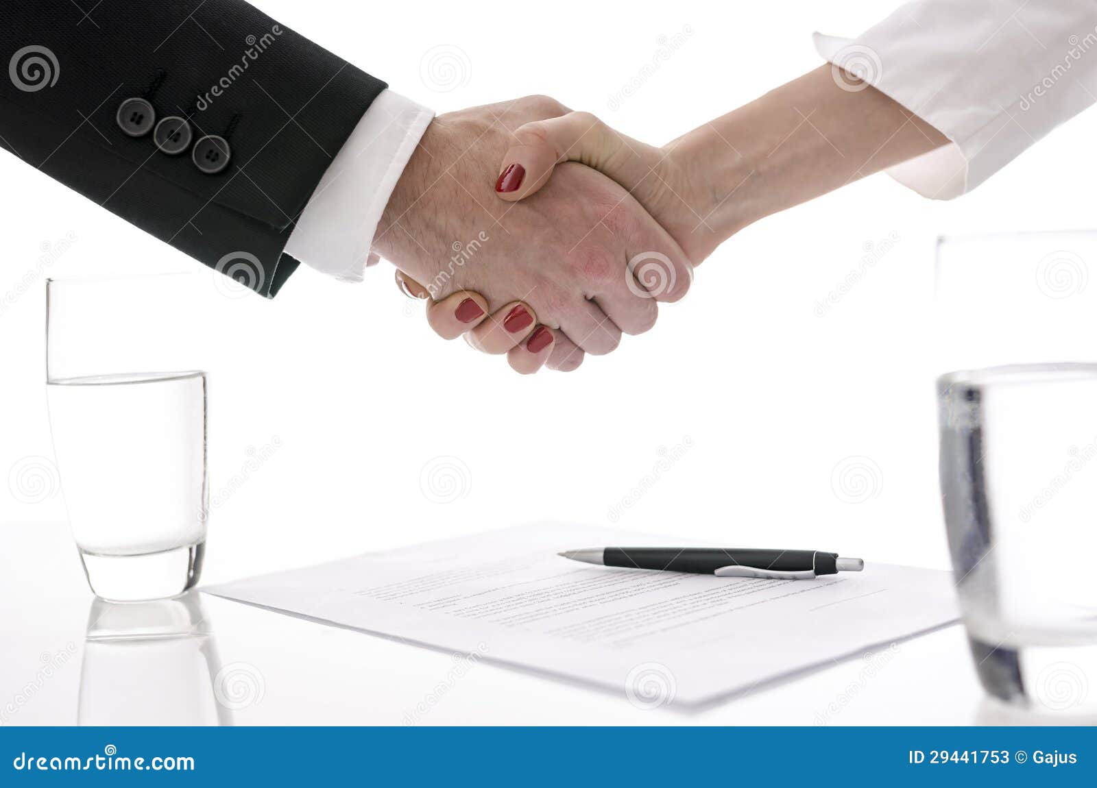 Handshake over a contract stock image. Image of conclusion - 29441753