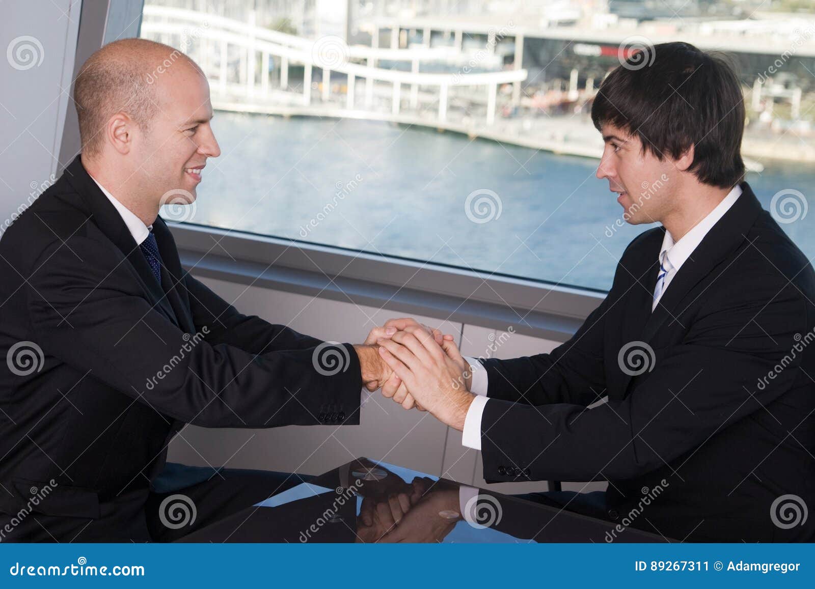Handshake over a deal stock image. Image of chair, businessmen - 89267311