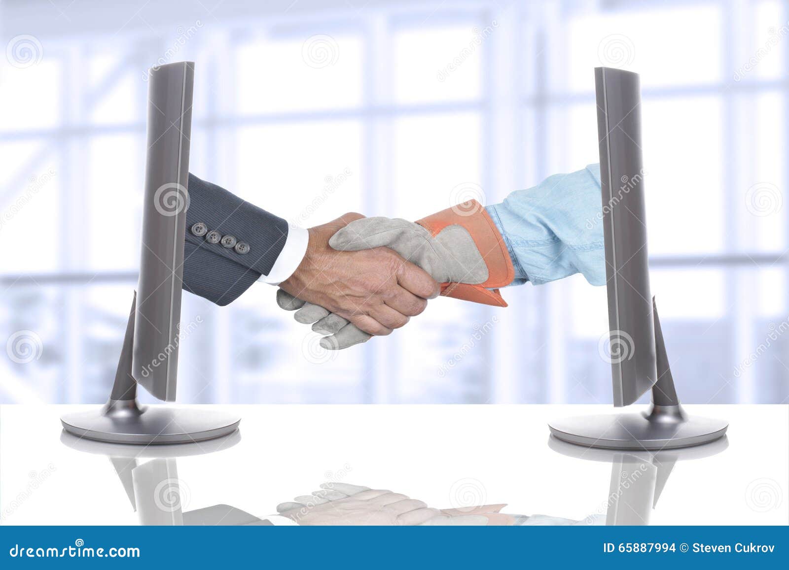 Handshake Over Desk in Business Office Stock Photo - Image of desk ...