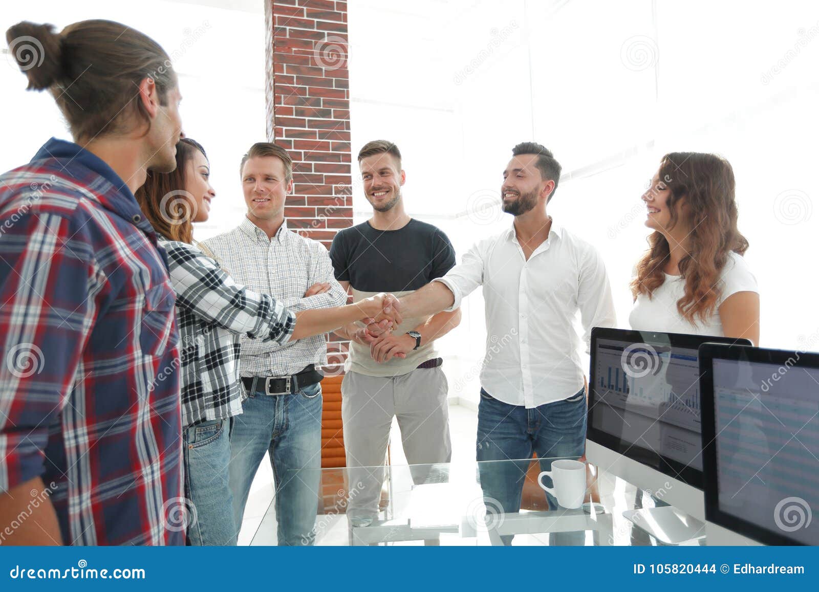 Handshake Partners in the Creative Office Stock Photo - Image of person ...