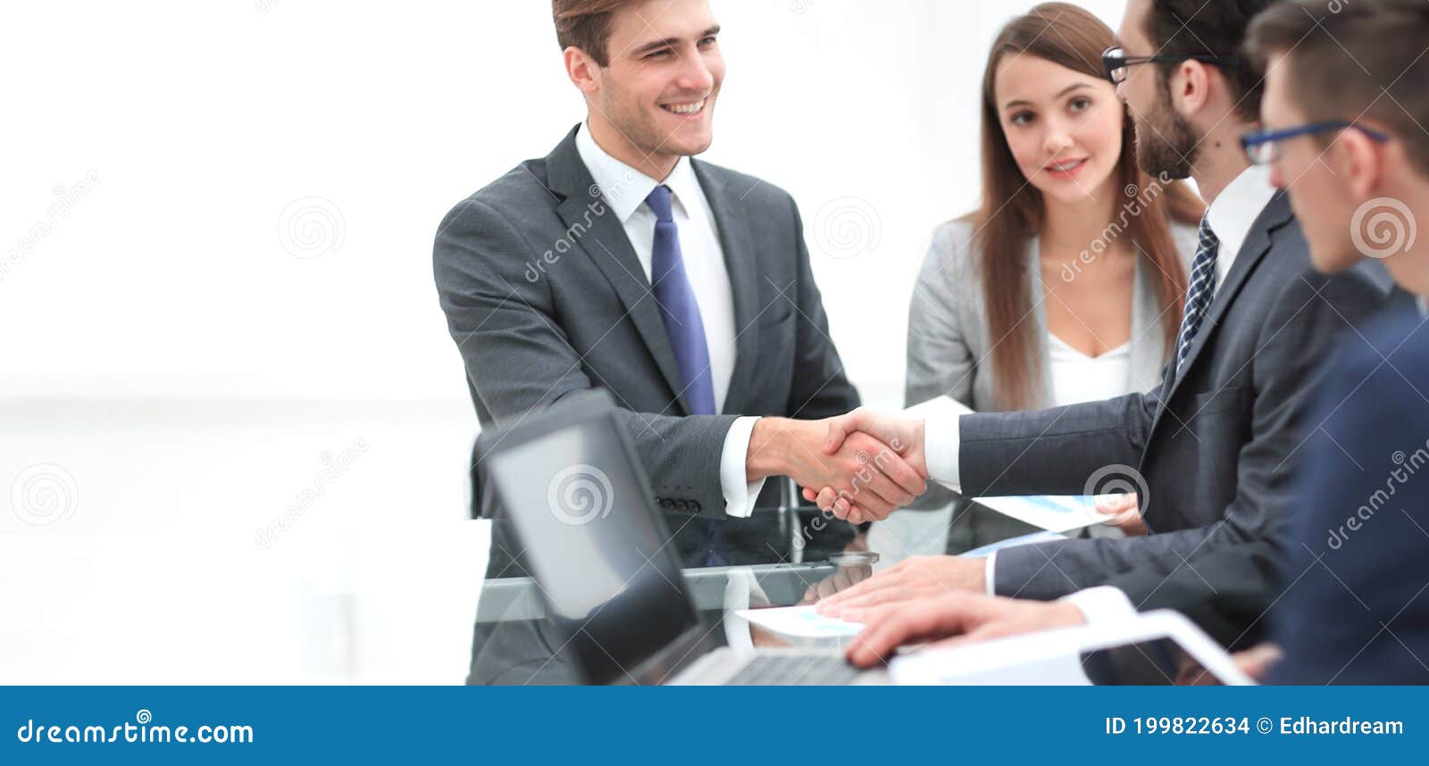 Handshake Partners at the Desk Stock Photo - Image of group, hands ...