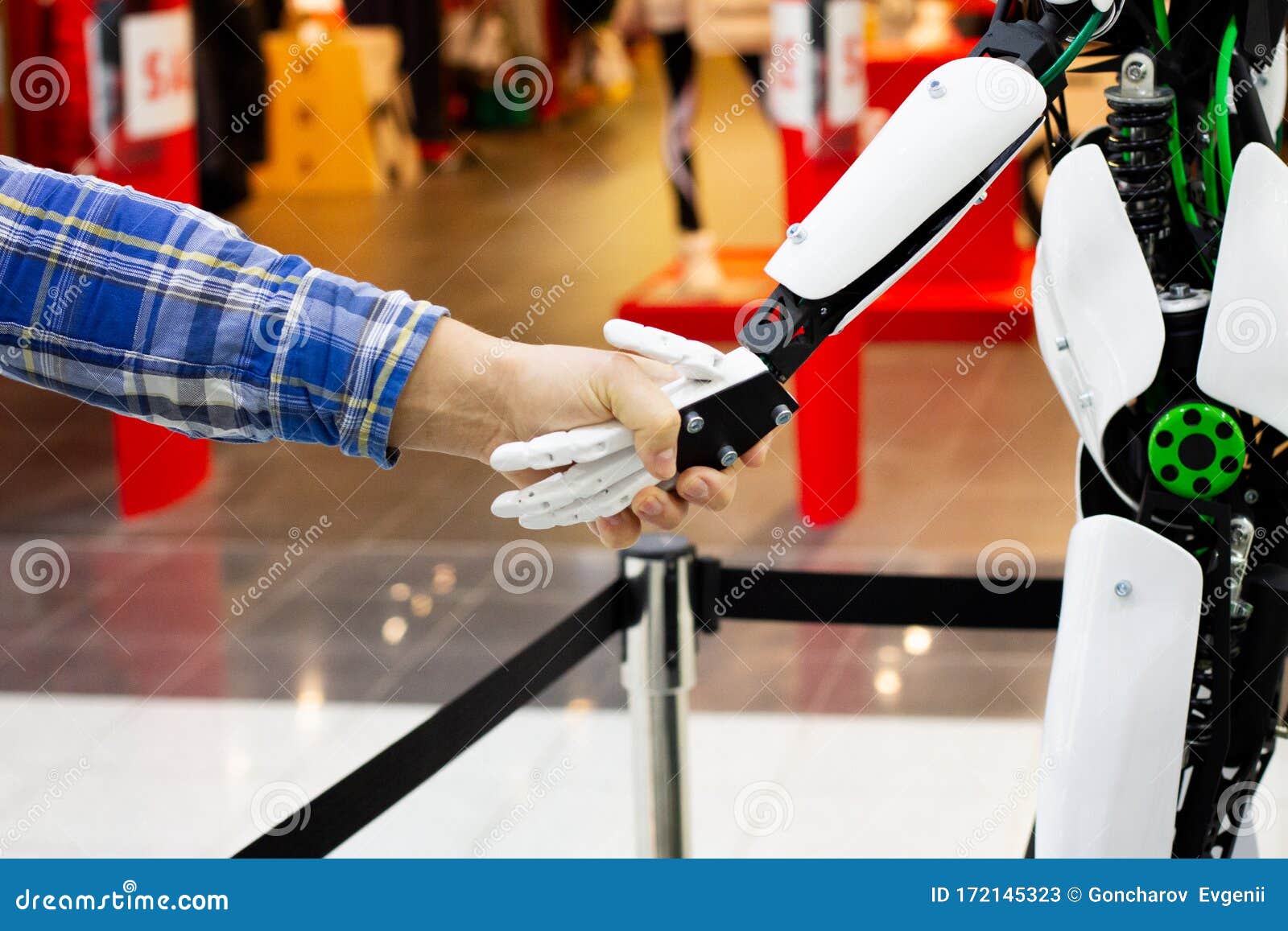 Handshake of a Robot and a Human, the Introduction of New Technologies ...