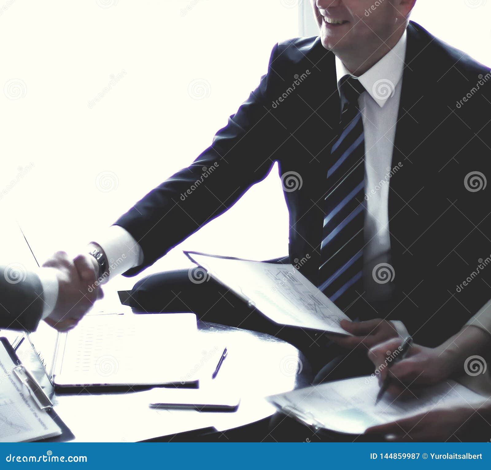 Handshake of Senior Business Partners on the Desk Stock Image - Image ...