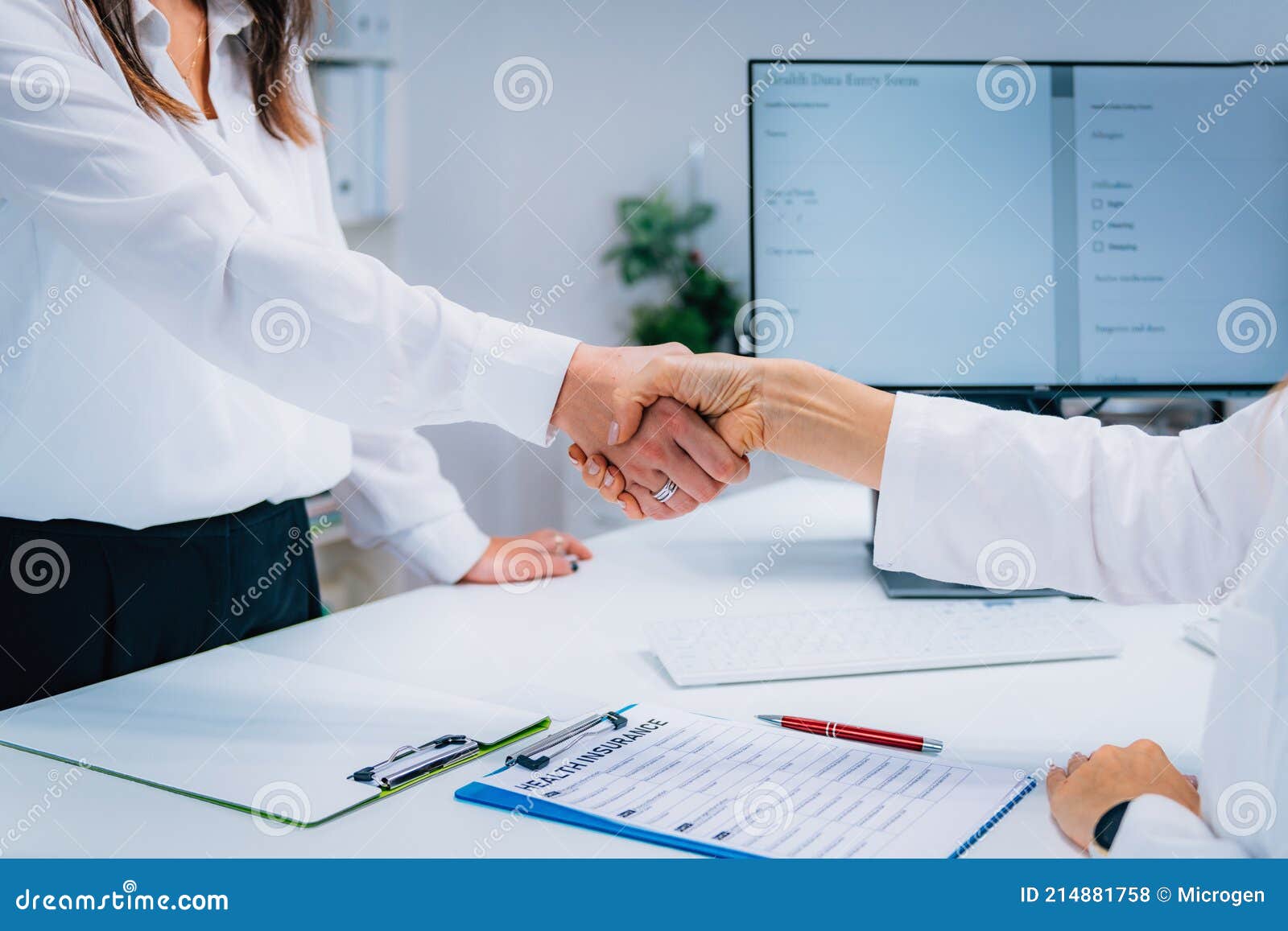 Handshake after Signing Health Insurance Form Stock Photo - Image of ...