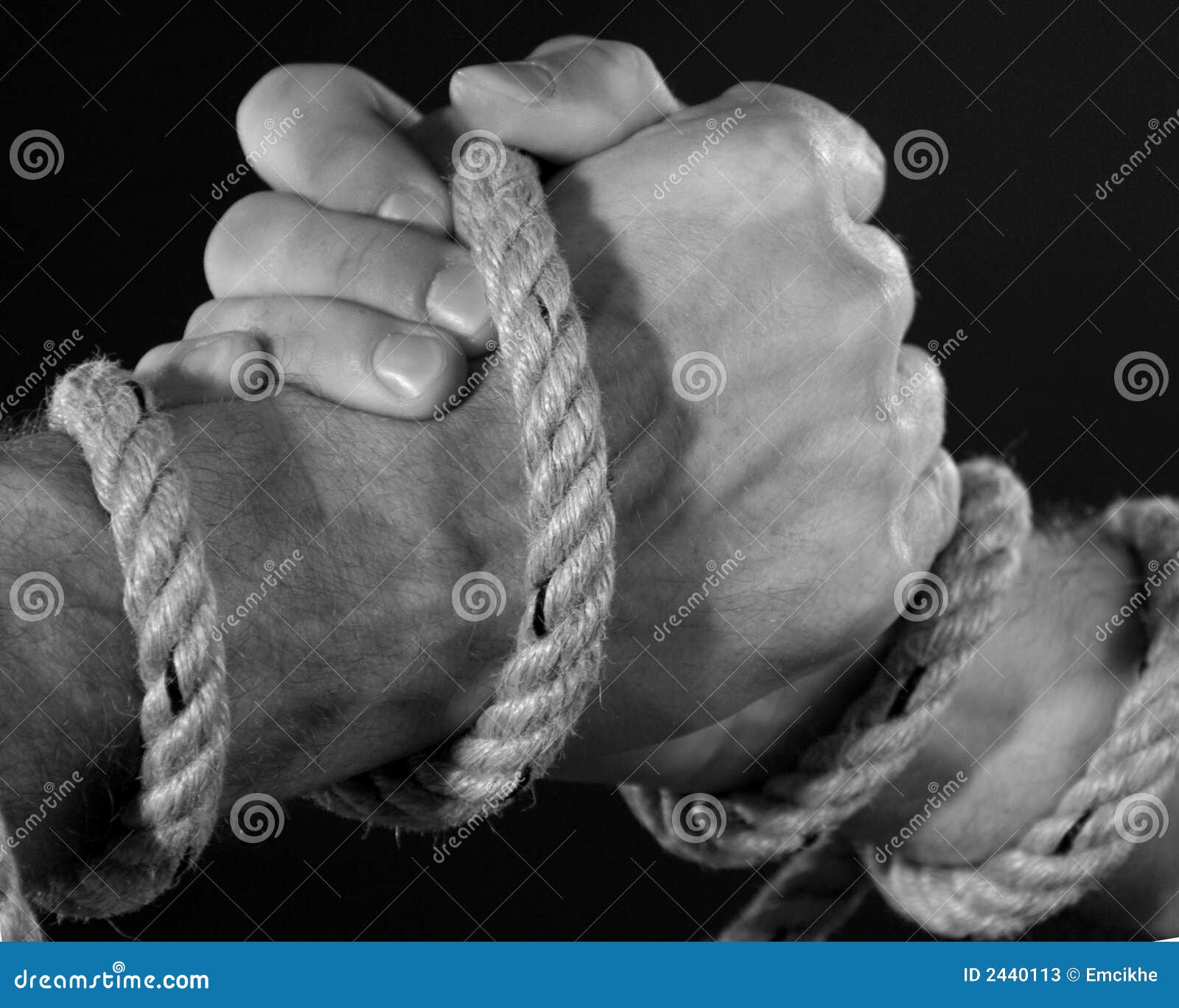 Handshake tied with rope stock image. Image of mission - 2440113