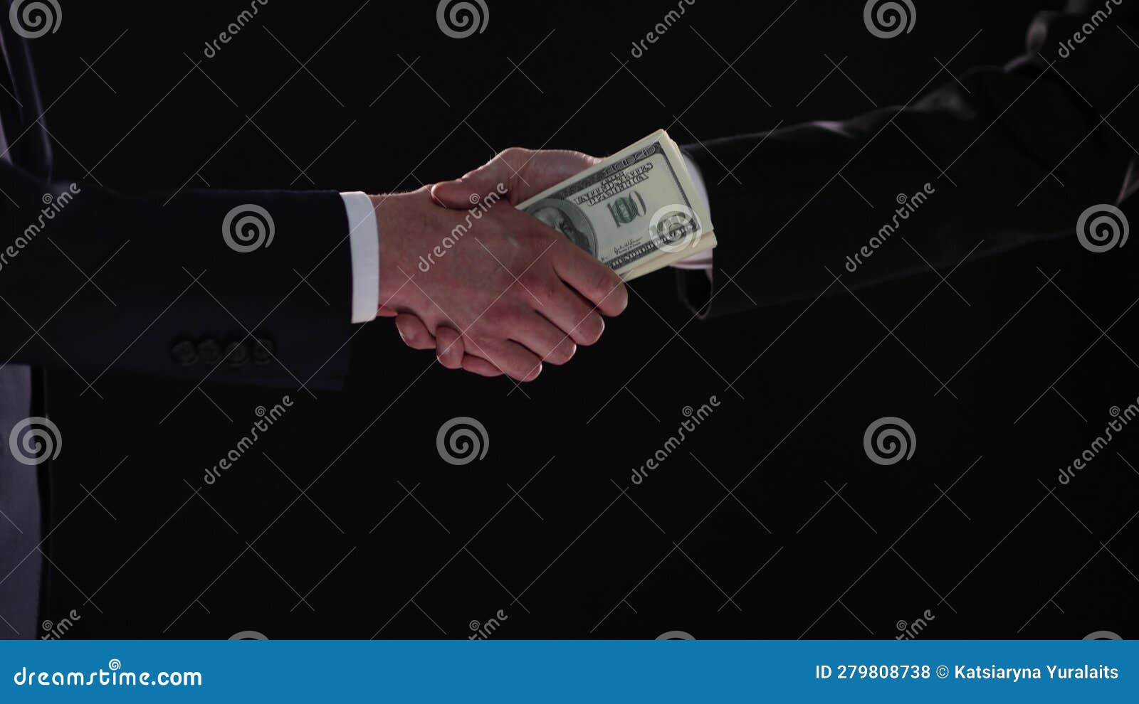 Handshake with the Transfer of Money on a Black Background Stock ...